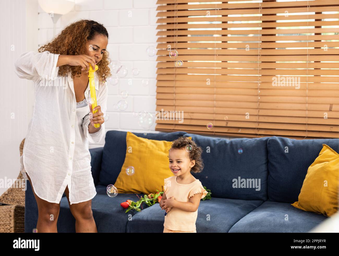 Parents teach children how to walk, hold objects, take turns, play ...