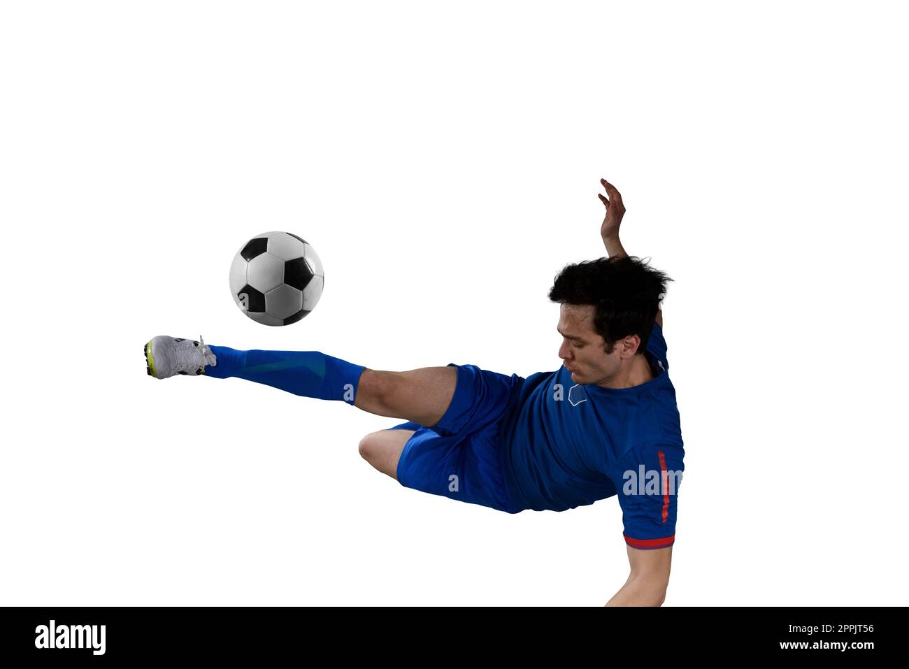 Close up of a football action scene with soccer player kicks a ...