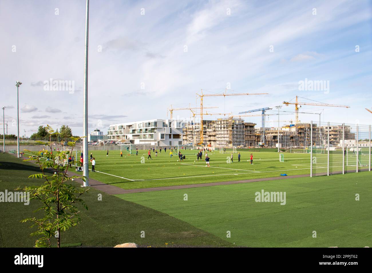 soccer sports field with kids training for football in Reykjavik ...