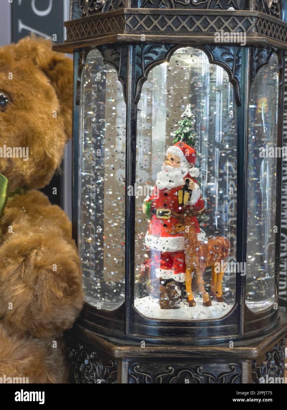 Santa Claus in a snow globe Christmas decoration Stock Photo - Alamy
