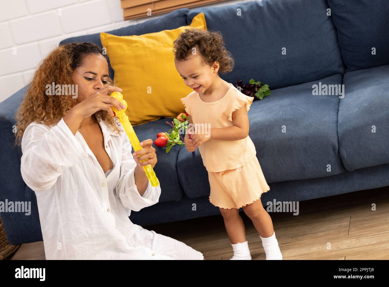 Parents teach children how to walk, hold objects, take turns, play ...