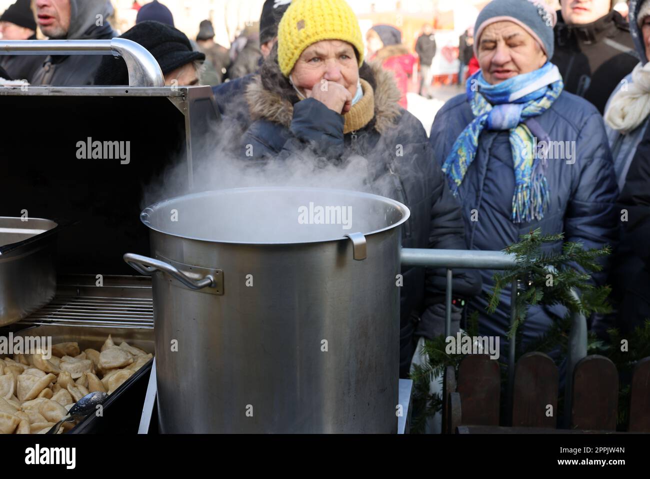 Christmas Eve for poor and homeless on the Main Square in Cracow Stock ...