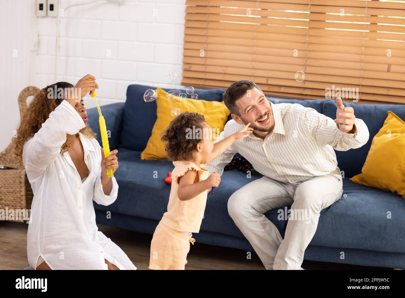 Parents teach children how to walk, hold objects, take turns, play ...