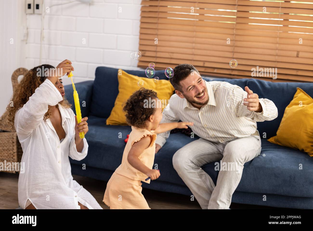 Parents teach children how to walk, hold objects, take turns, play ...