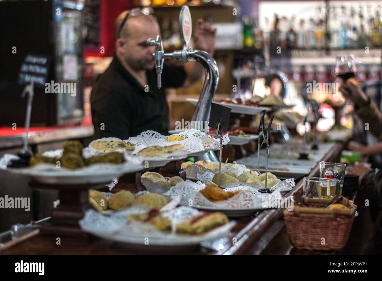 Spain bar food bartender hi-res stock photography and images - Alamy