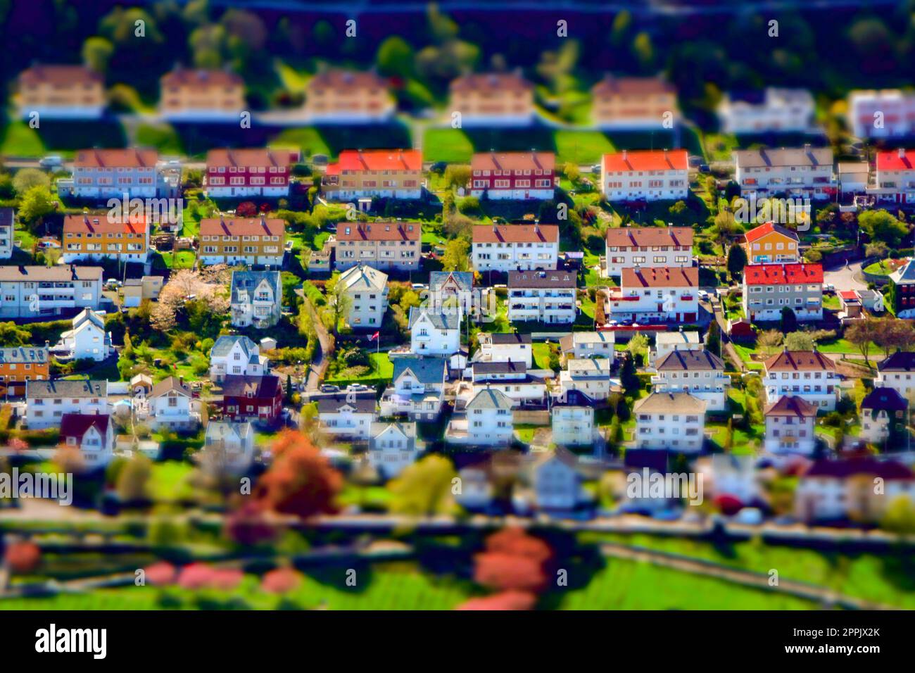 Tilt-shift creative image of an upper-class suburb residential city ...