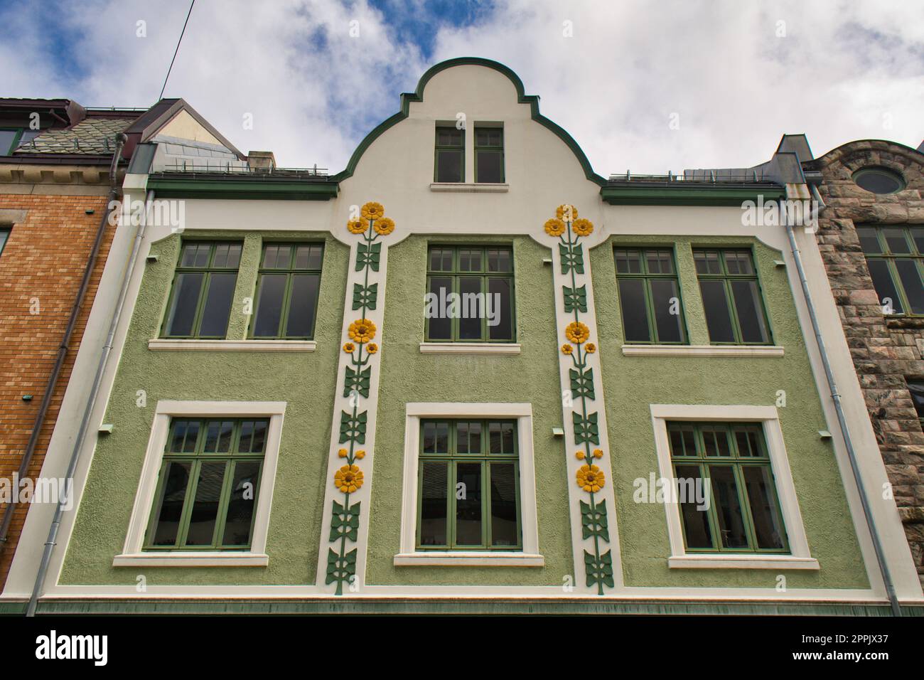 Vertical shot of the architecture of Kongens gate 12 in Alesund, Norway ...