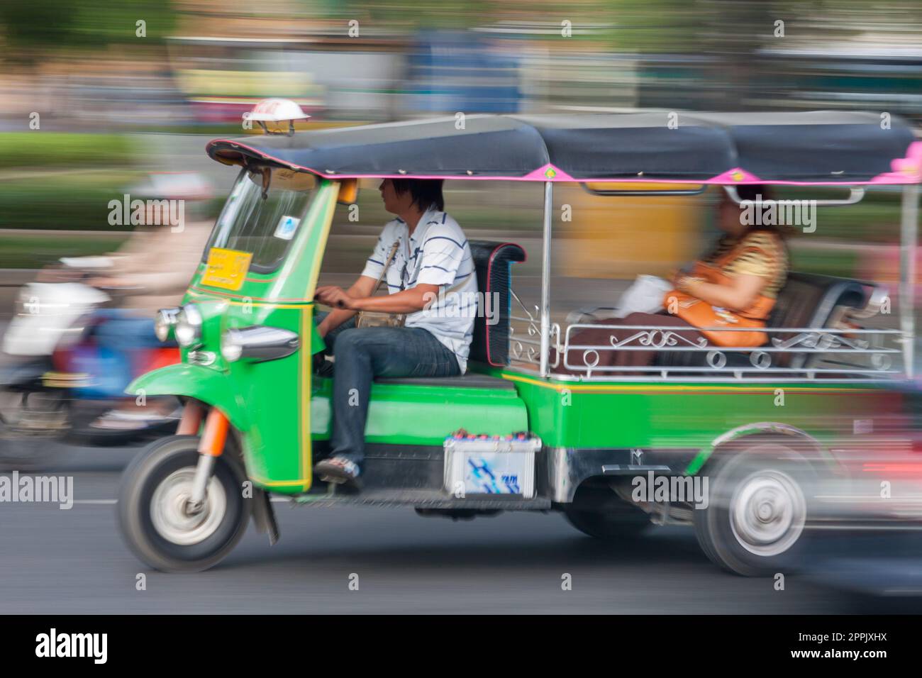 Traditional tuk-tuk from Bangkok, Thailand, in motion blur Stock Photo - Alamy