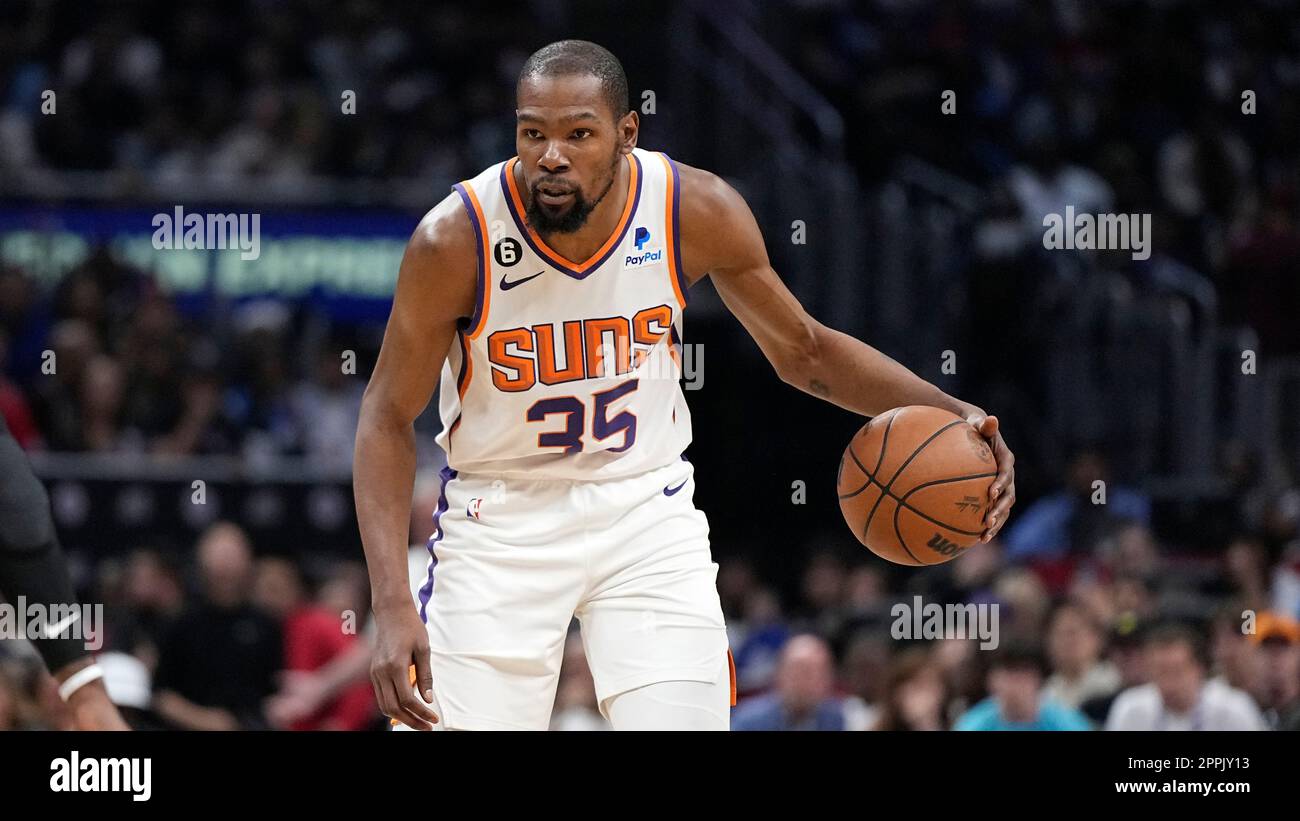 Phoenix Suns forward Kevin Durant dribbles during the second half in ...