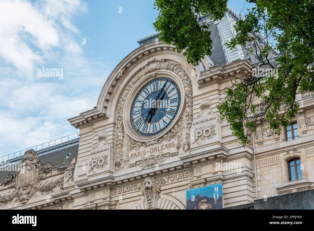 Classical clock at the facade of the museum d'Orsay in Paris Stock ...