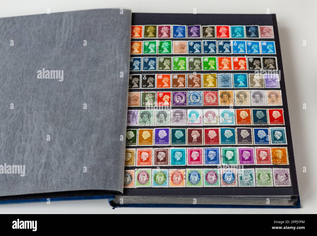 Stamp collection catalog hi-res stock photography and images - Alamy