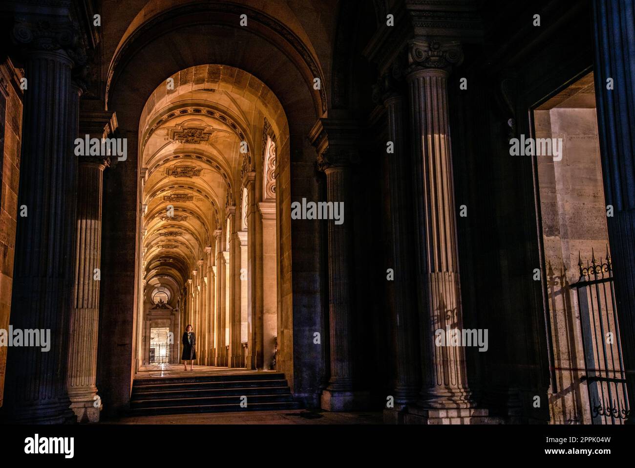 The famous Louvre Palace of Paris at night Stock Photo - Alamy