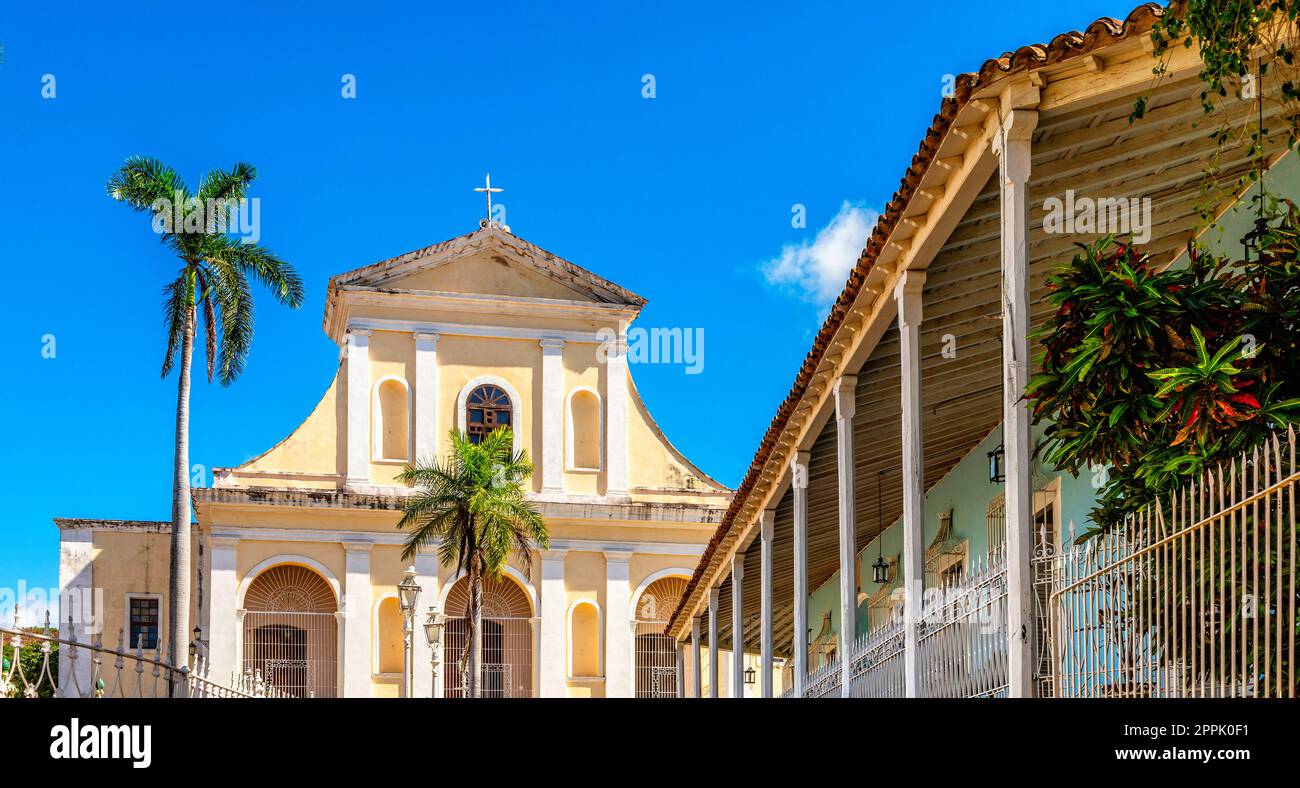 Trinidad central square with palms and Church of the Holy Trinity ...