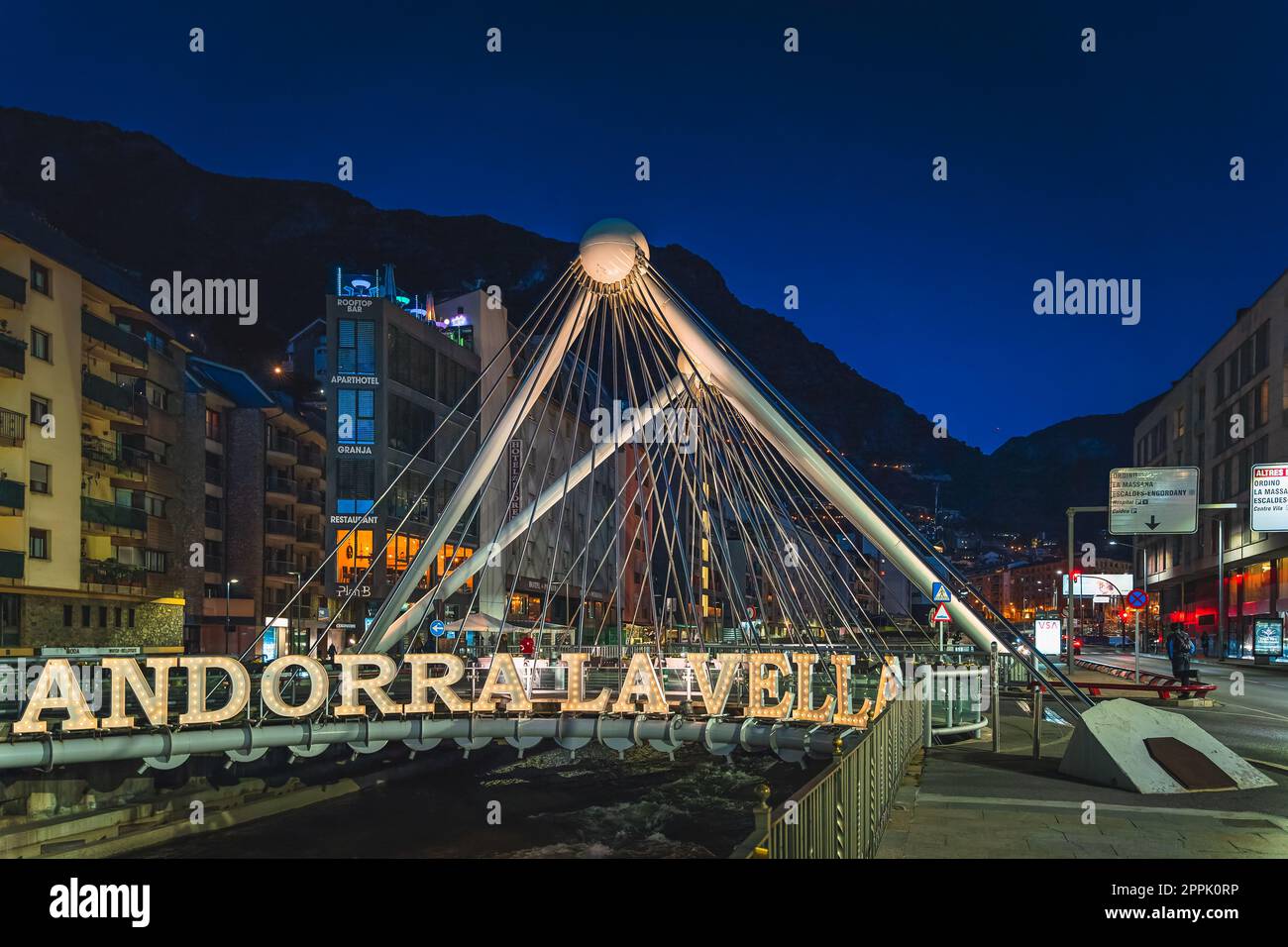 Illuminated Pont de Paris bridge crossing Gran Valira river at night, Andorra Stock Photo - Alamy