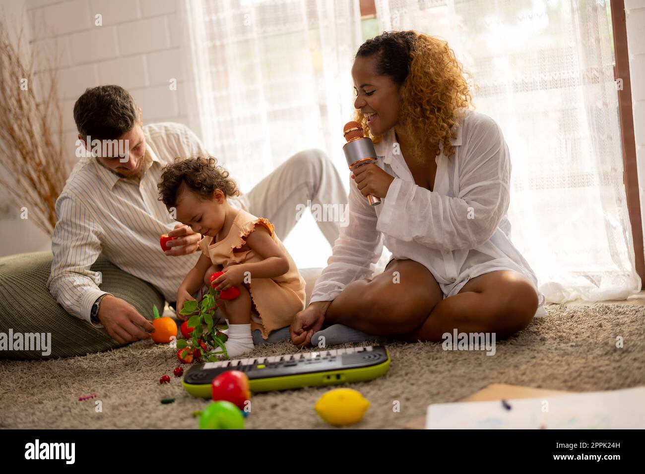 Parents teach children how to walk, hold objects, take turns, play ...