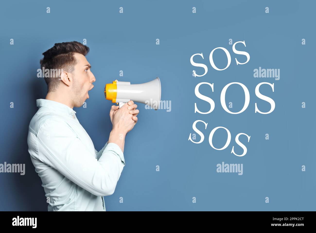 Man shouting into megaphone and words SOS on color background. Asking ...