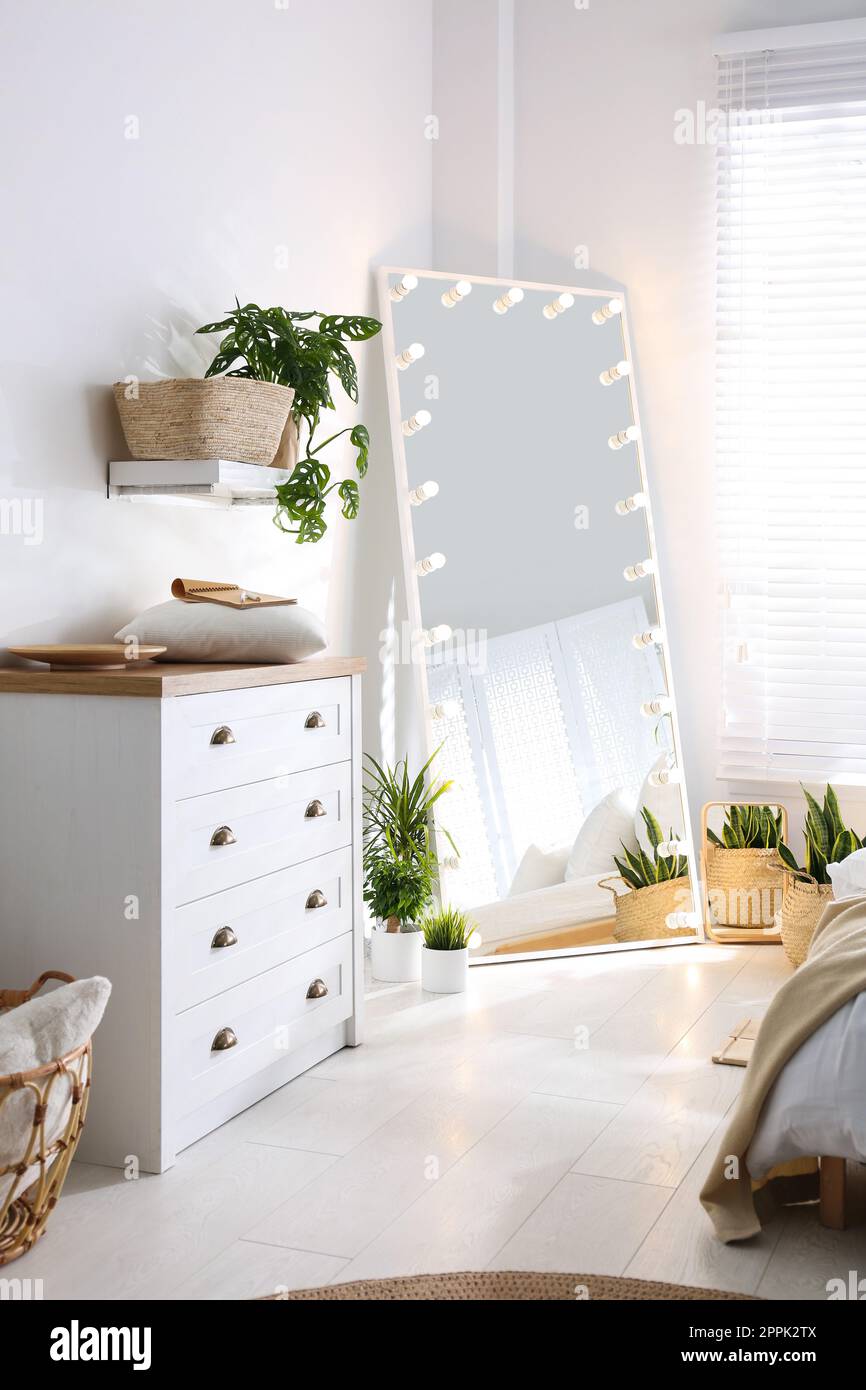 White chest of drawers in beautiful bedroom. Interior design Stock ...