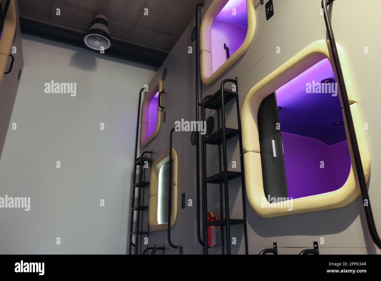 Capsules in modern pod hostel. Stylish interior Stock Photo - Alamy