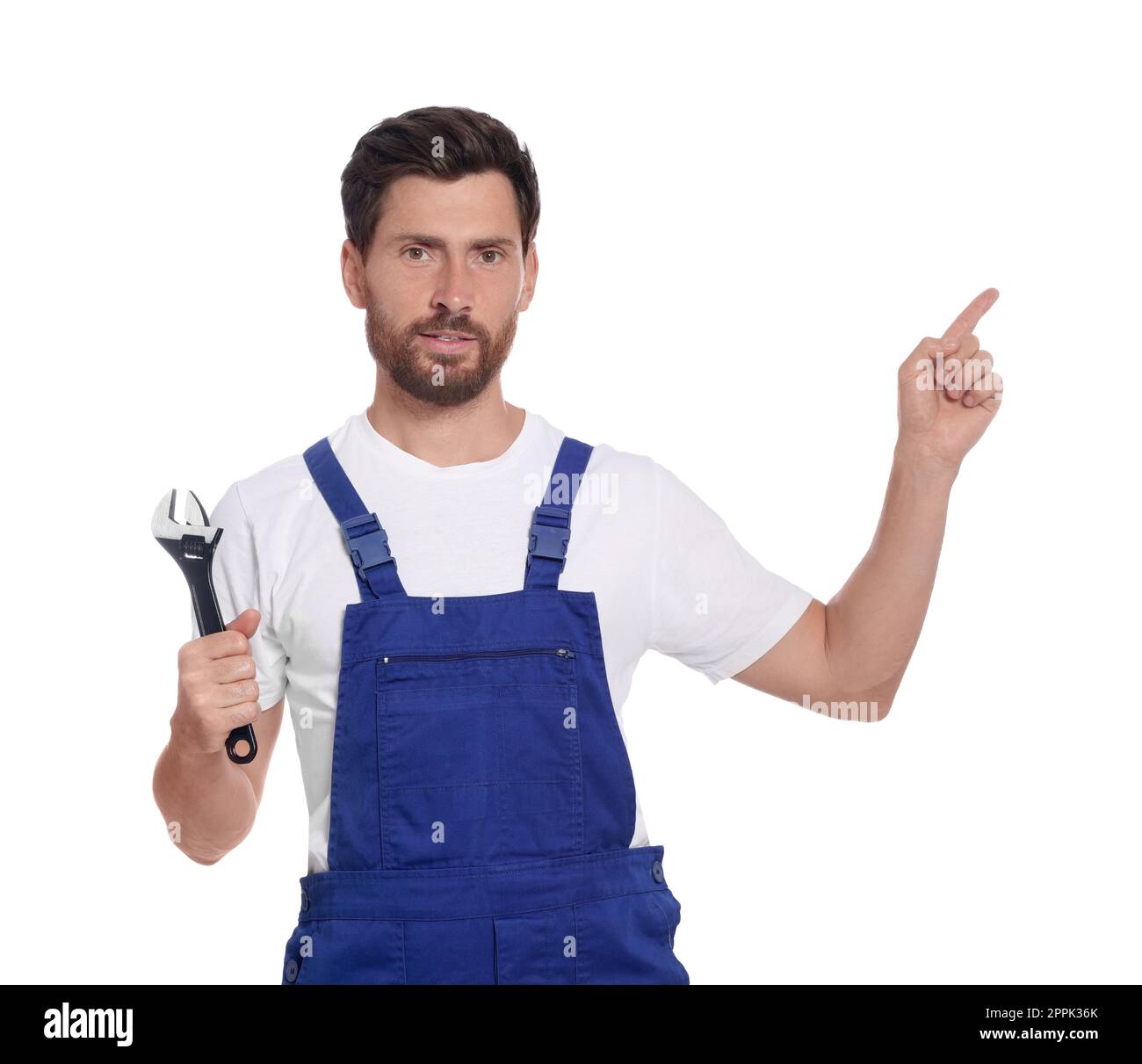 Professional plumber with adjustable wrench on white background Stock ...