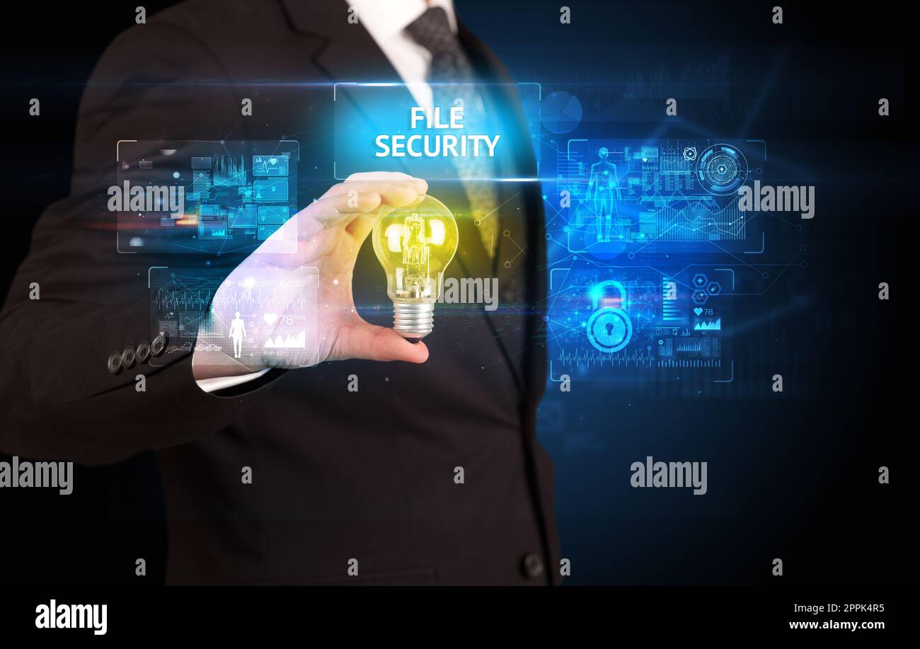 Businessman holding a light bulb, online security concept Stock Photo ...