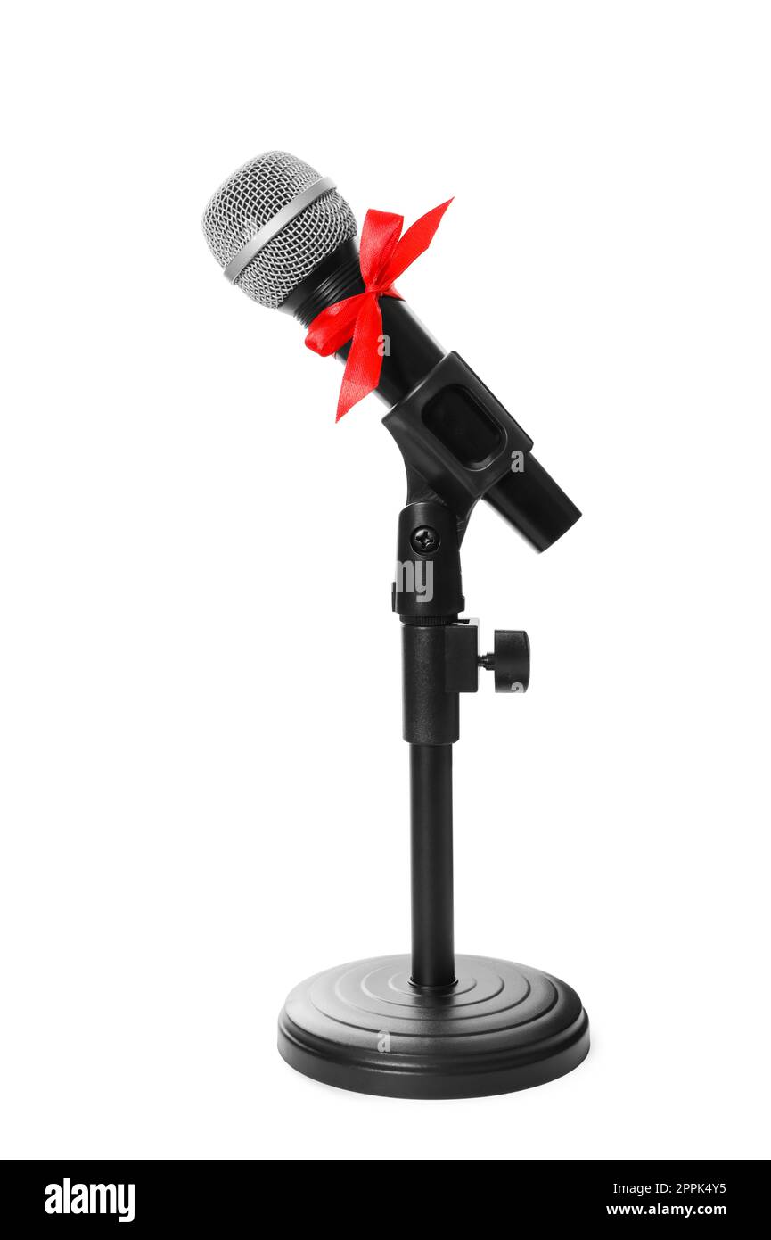 Microphone with red bow isolated on white. Christmas music Stock Photo ...