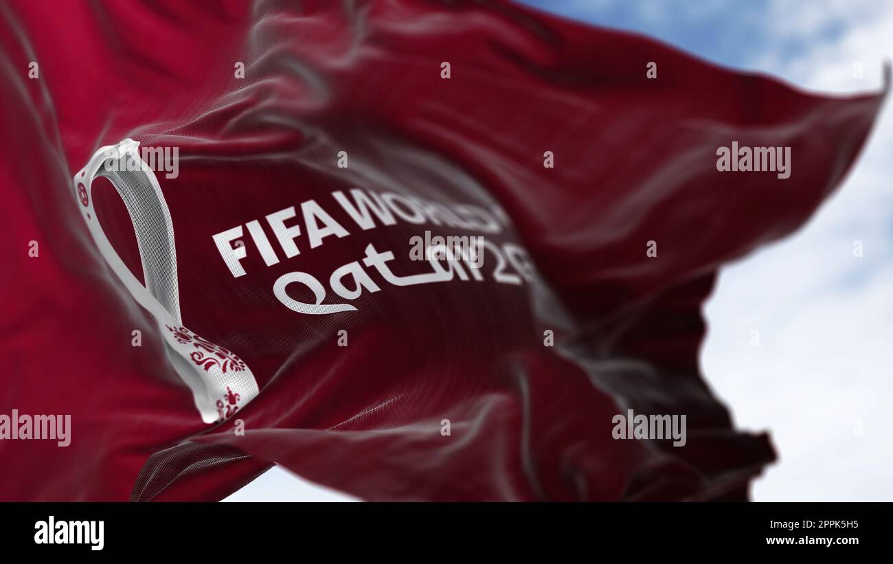 Close-up view of the FIFA Qatar 2022 World Cup flag waving in the wind ...