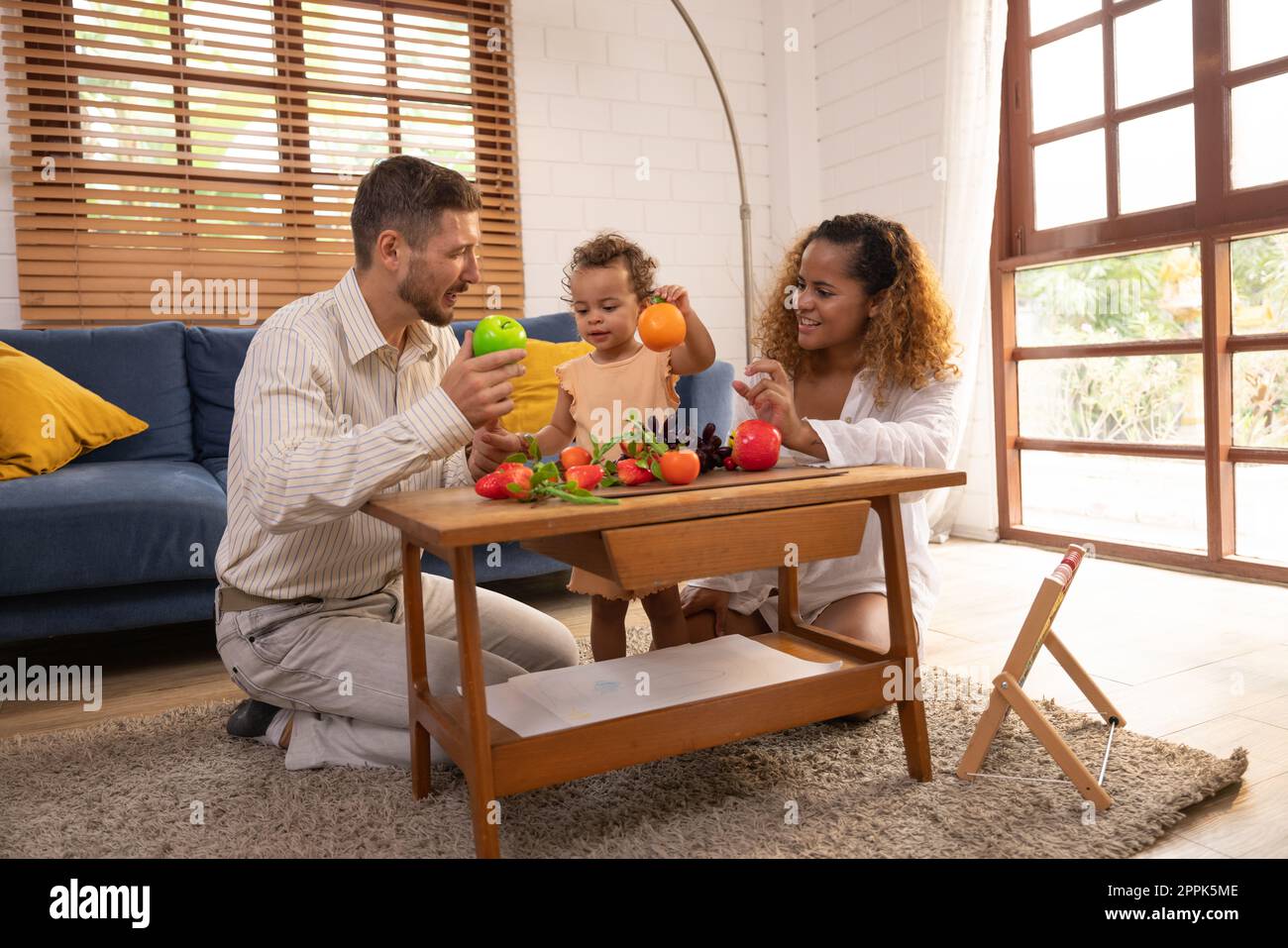 Parents teach children how to walk, hold objects, take turns, play ...
