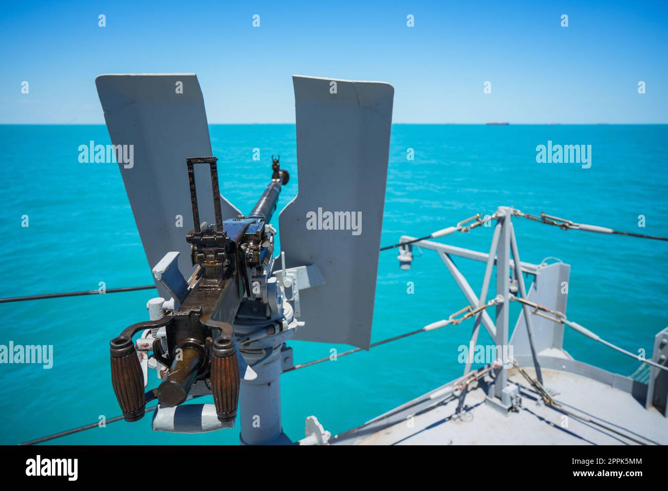 Automated machine gun on the deck of a military ship Stock Photo - Alamy