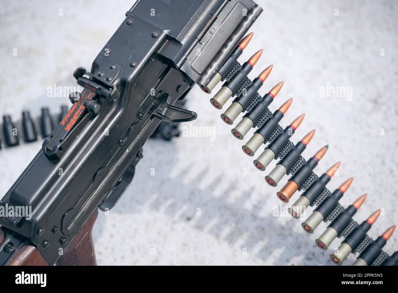 Machine gun belt loaded with cartridges Stock Photo - Alamy