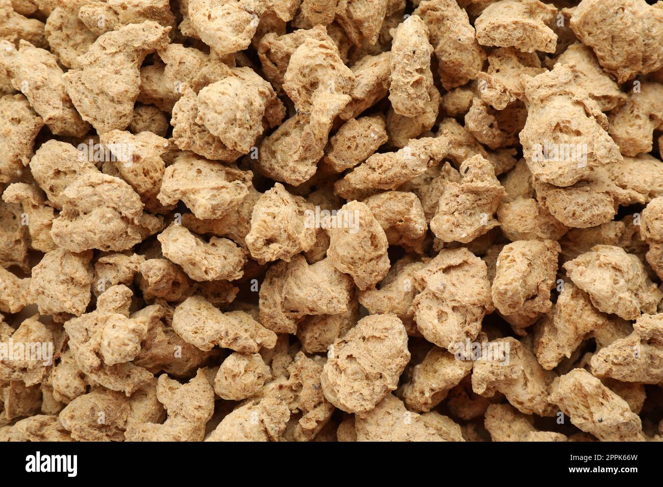 Dehydrated soy meat chunks as background, top view Stock Photo - Alamy