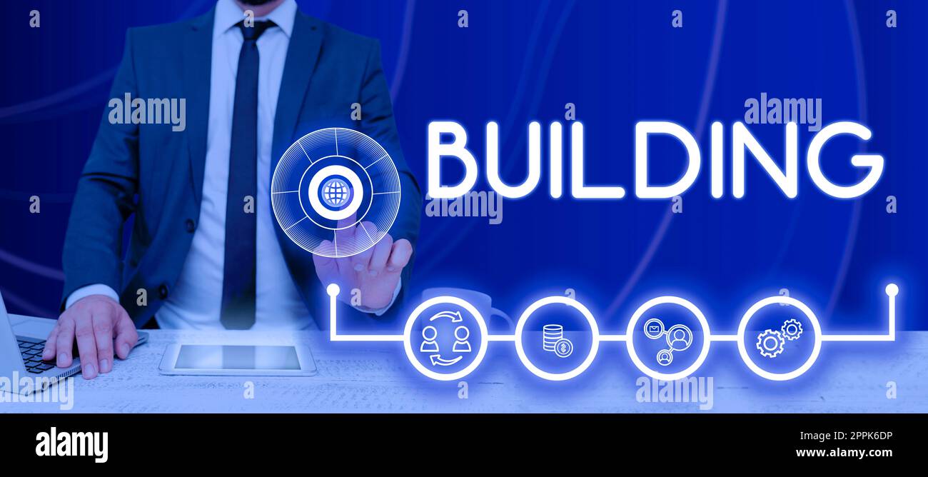 Hand writing sign Building. Business approach the art or business of ...