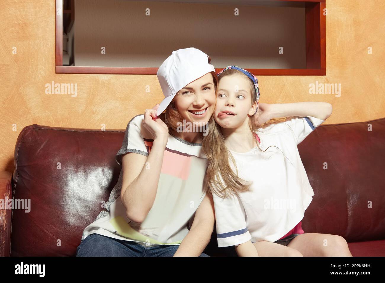 Mother and daughter fooling around at home Stock Photo - Alamy