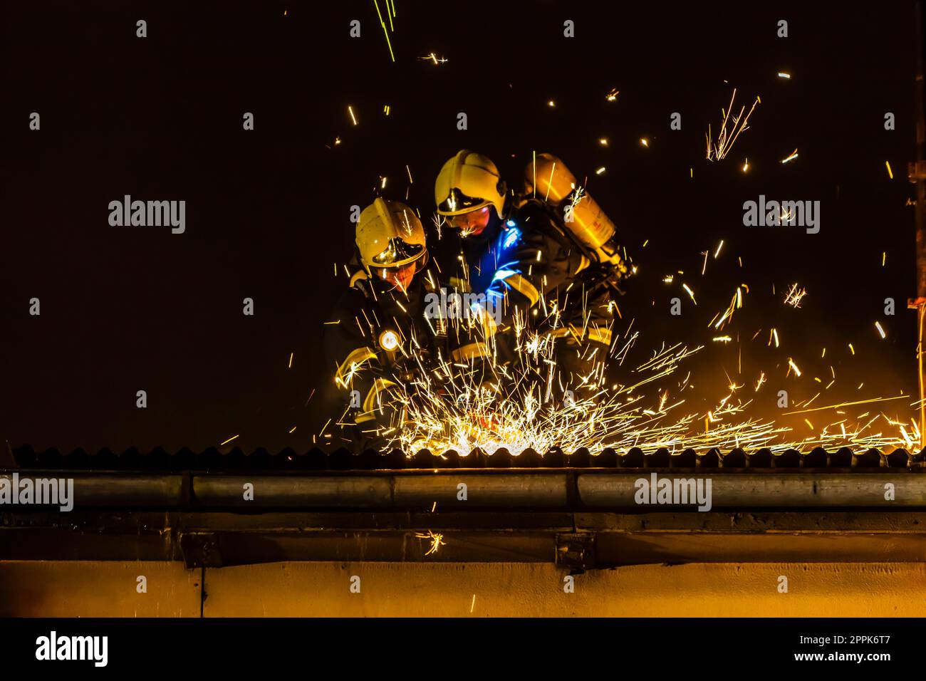 firefighters during extinguishing of the fire Stock Photo - Alamy