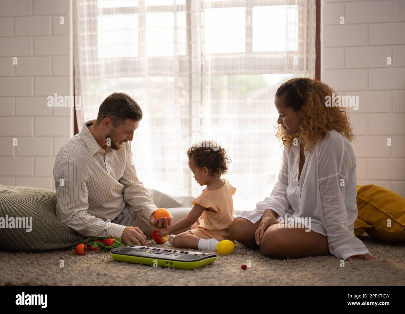 Parents teach children how to walk, hold objects, take turns, play ...