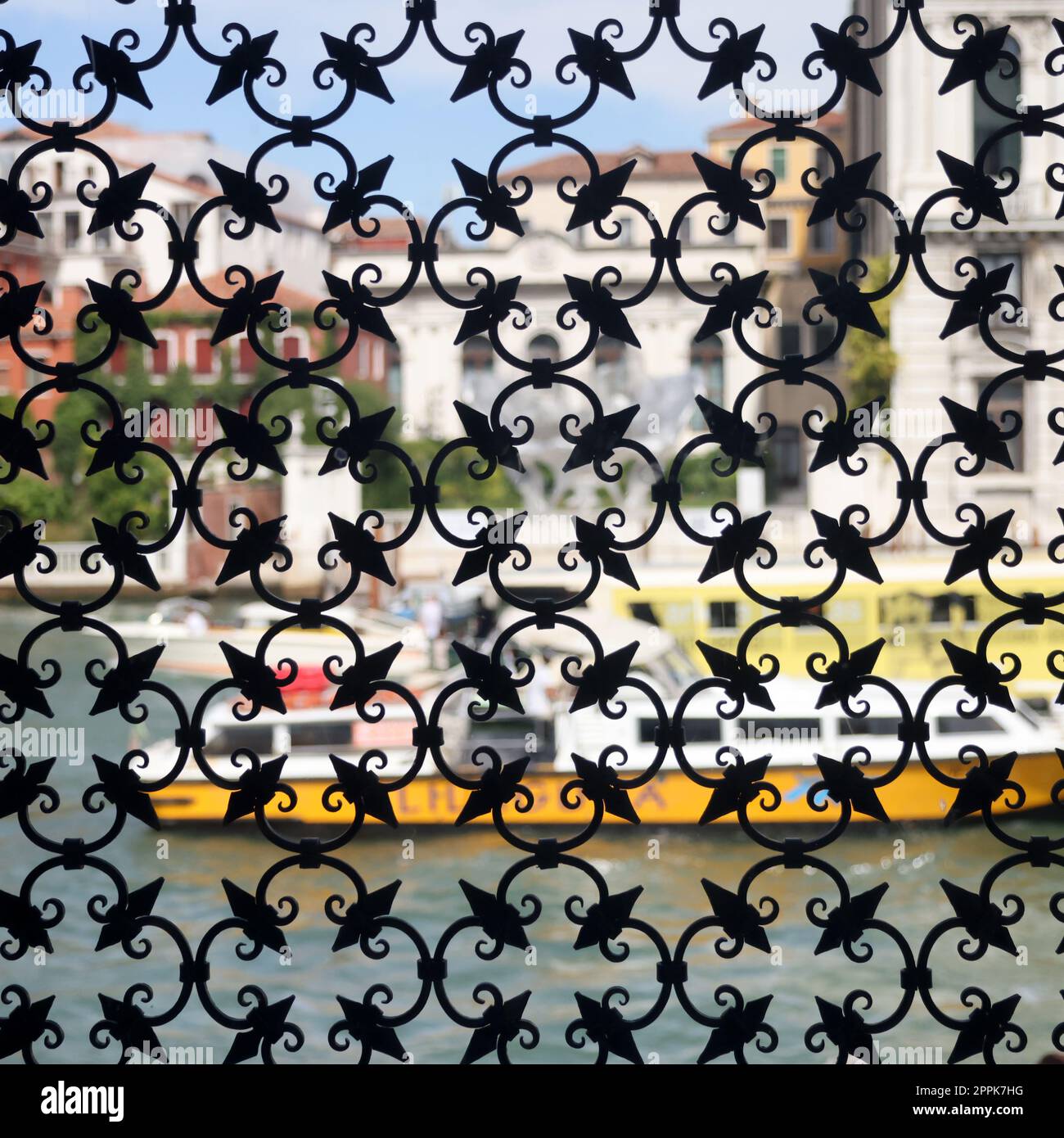 Detail of an ancient window with grating in wrought iron. Venice Stock ...