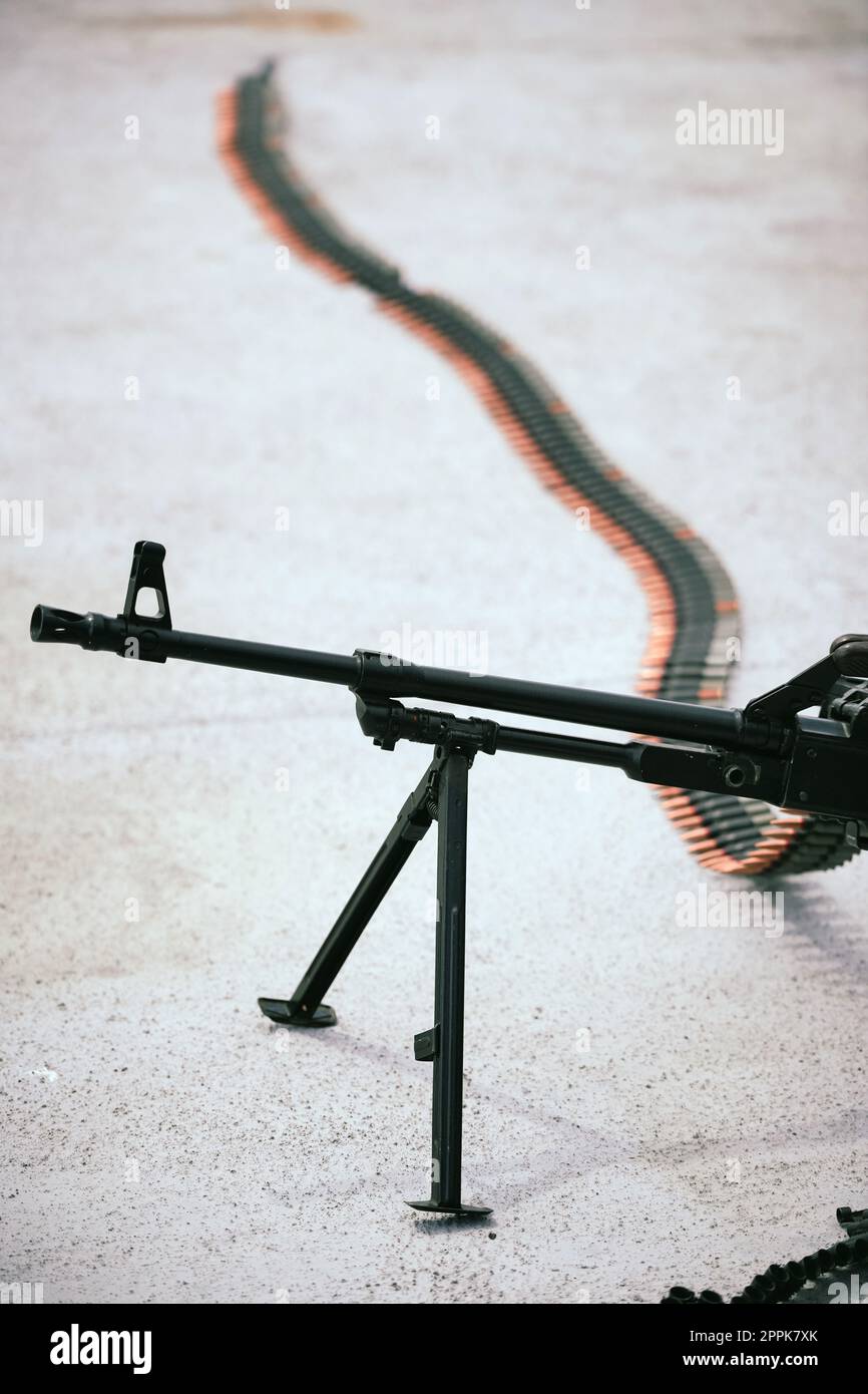 Machine gun belt loaded with cartridges Stock Photo - Alamy
