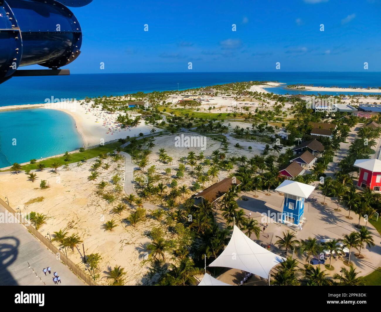 Beach on Ocean Cay Bahamas Island with a colorful houses and turquoise ...