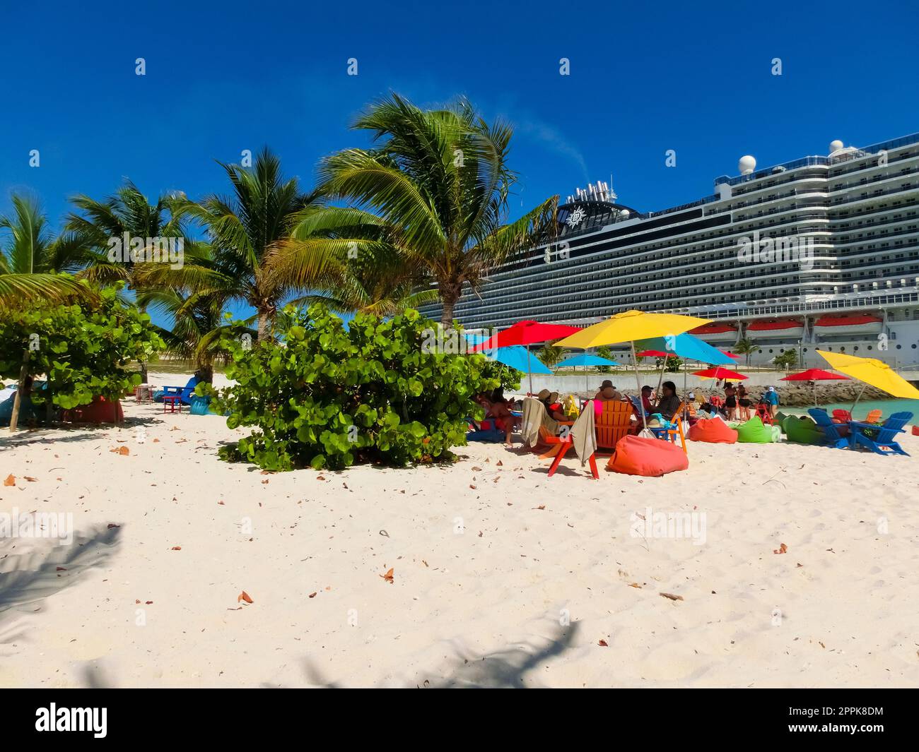Ocean Cay, Bahamas - May 04, 2022: People resting at beach on Ocean Cay ...