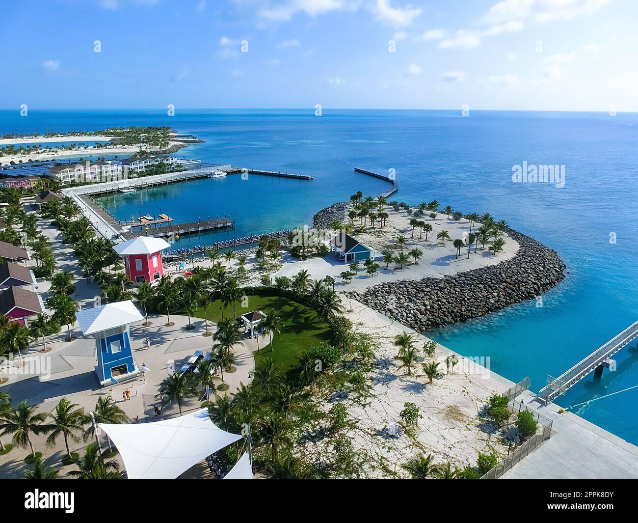 Beach on Ocean Cay Bahamas Island with a colorful houses and turquoise ...