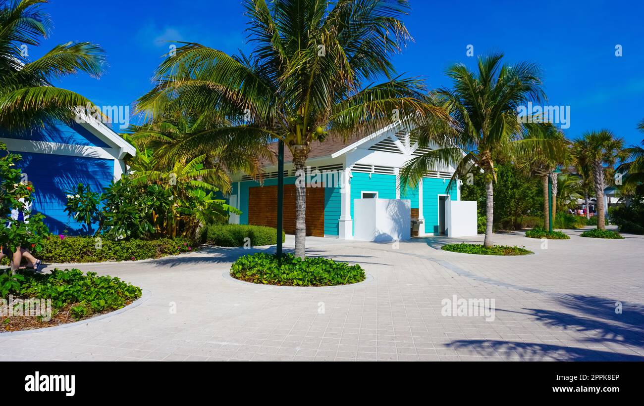 Beach on Ocean Cay Bahamas Island with a colorful houses and turquoise ...