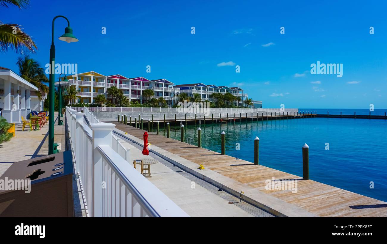 Beach on Ocean Cay Bahamas Island with a colorful houses and turquoise ...