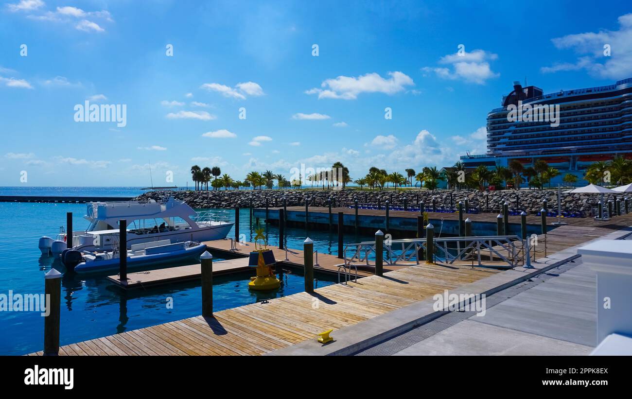 Beach on Ocean Cay Bahamas Island with a colorful houses and turquoise ...