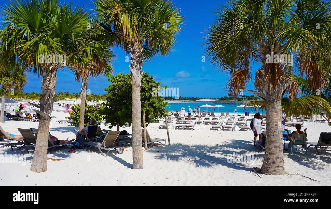 Beach on Ocean Cay Bahamas Island with a colorful houses and turquoise ...