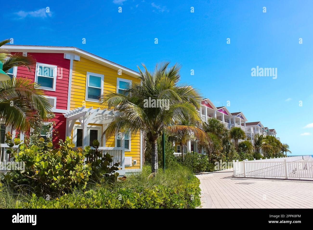 Beach on Ocean Cay Bahamas Island with a colorful houses and turquoise ...