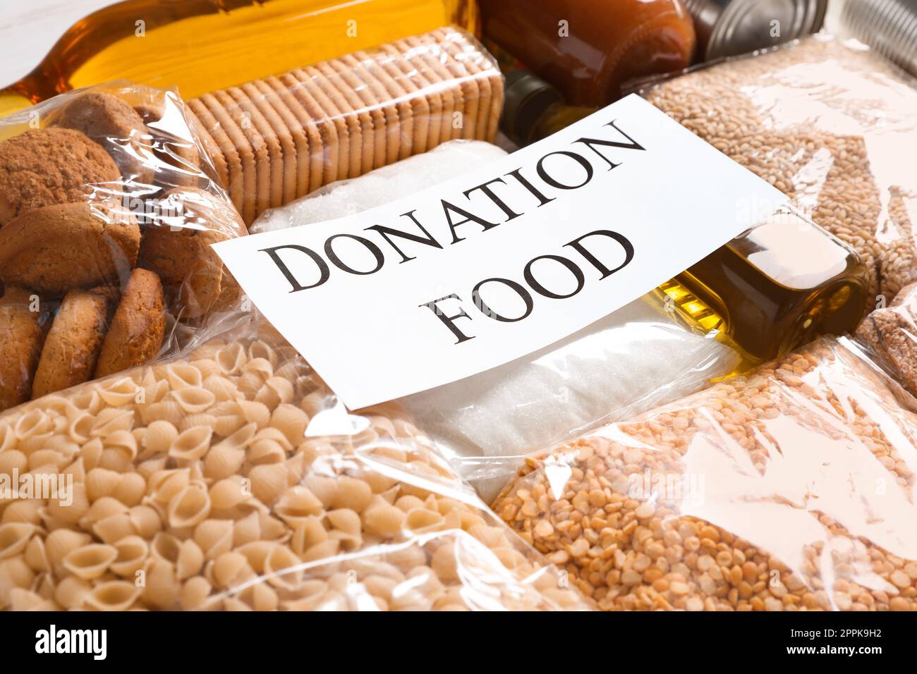 Card with words Donation Food on different products, closeup Stock ...