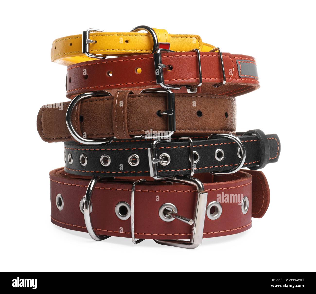 Different leather dog collars on white background Stock Photo - Alamy