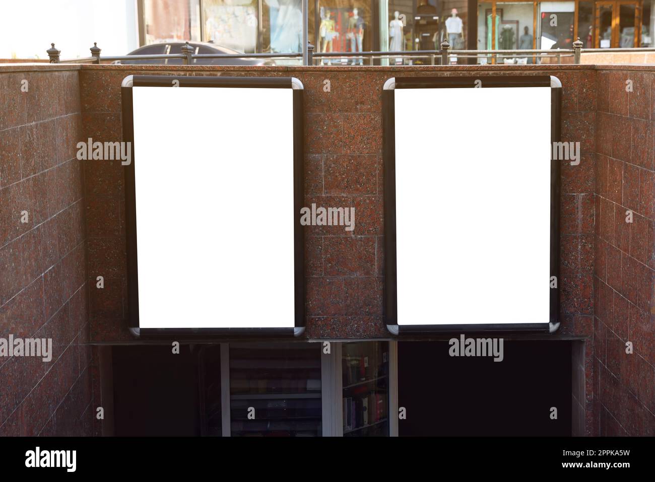 Blank posters on wall outdoors. Space for design Stock Photo - Alamy