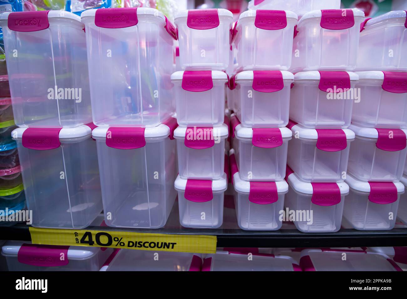 Colorful plastic hot pot lunch box for sale at a supermarket, in ...
