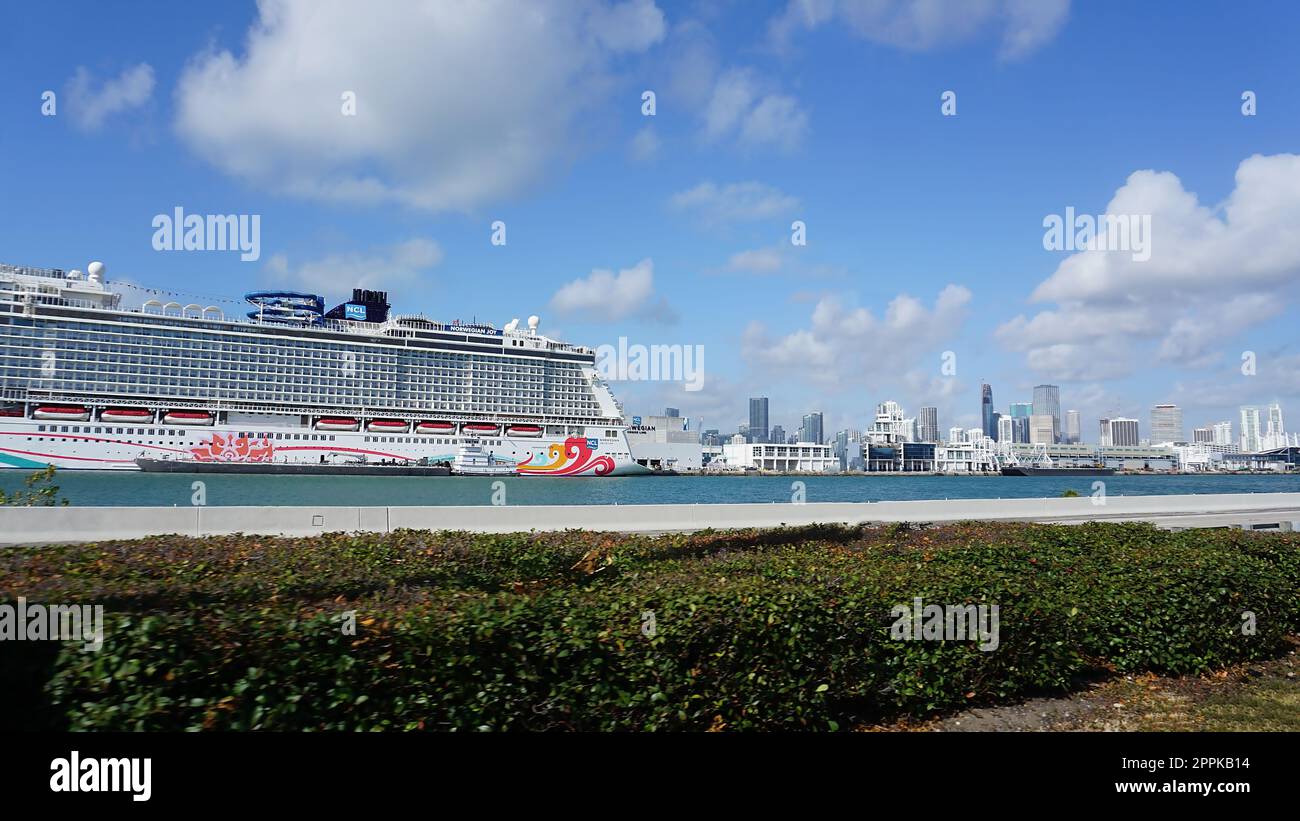 Port of Miami with cruise ships Norwegian Joy. Miami is a major port in ...
