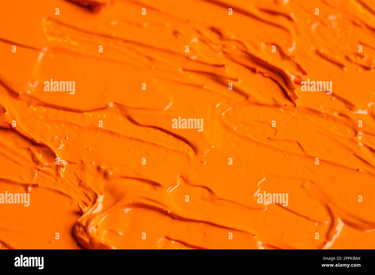 Beautiful strokes of orange oil paint as background, closeup Stock ...